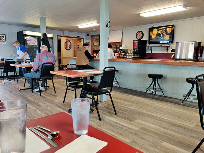 The counter offers front-row seats to the kitchen action, where regulars gather for coffee and conversation as much as for the food.