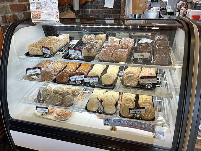 The bakery display case showcases breads and pastries that would make your grandmother both proud and slightly jealous of their perfection.