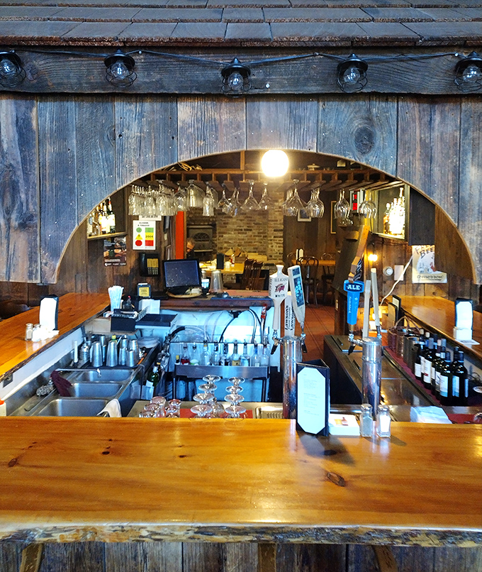 The rustic bar area feels like it was crafted by woodland elves who really understand the importance of good coffee and conversation.