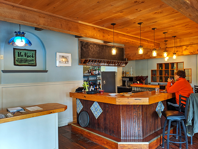 The bar area's wooden charm and stained glass accents make it the perfect perch for pre-dinner drinks or post-meal lingering.