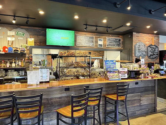 Myer's rustic bar area invites you to linger, with wood paneling and exposed brick creating a cozy backdrop for bagel-based adventures.