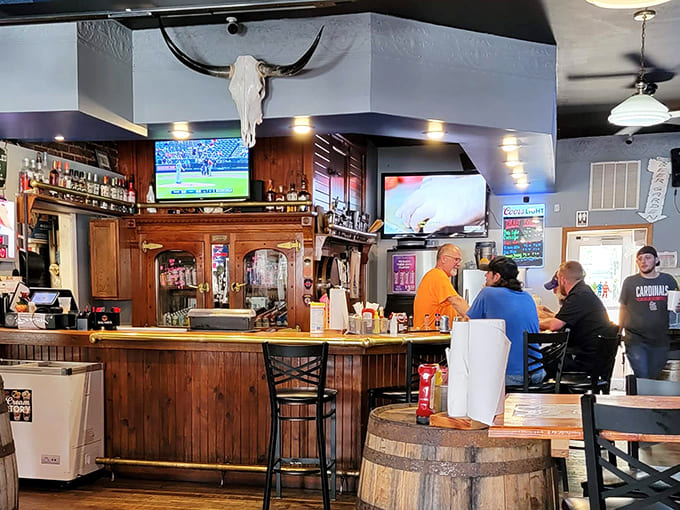 The bar area, complete with bull skull and wooden accents, serves as command central for cold drinks and warm conversation.
