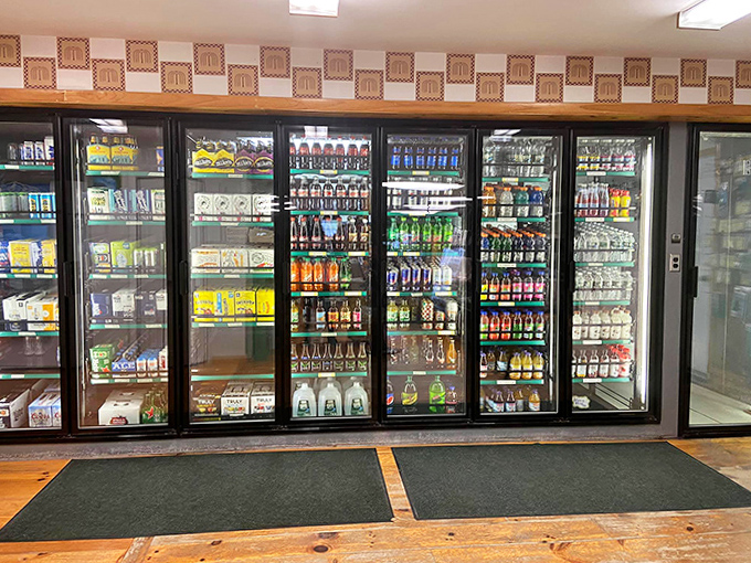 The beverage coolers offer a rainbow of refreshment options, from craft sodas to local beers, all perfectly chilled for lakeside sipping.