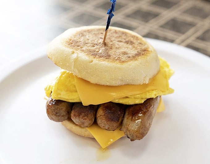 Breakfast perfection between two buns! This sandwich is what happens when breakfast decides to dress up and go to town.