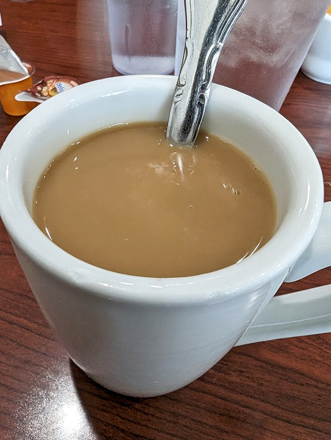 Liquid gold in a mug! This coffee looks strong enough to wake up Sleeping Beauty without the need for a prince.