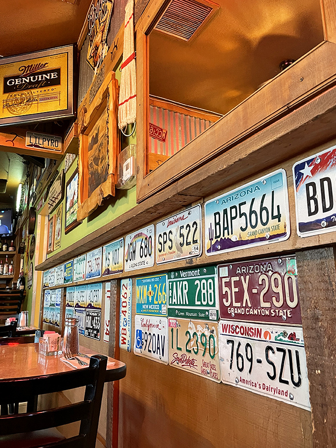 Every inch of wall space tells a story &ndash; vintage license plates create a patchwork of American road trips and distant adventures.