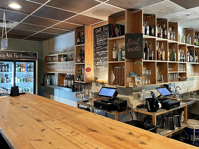 The bar counter invites solo diners and curious imbibers to pull up a stool and discover their next favorite bottle.