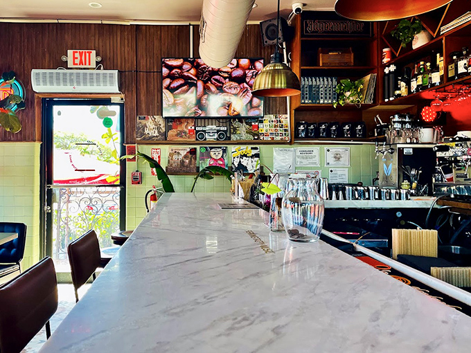 Marble magnificence &ndash; this sleek counter invites solo diners to perch and savor both exceptional food and the convivial energy flowing through the space.