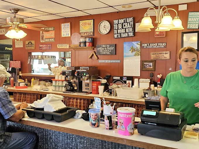 The busy counter area mixes friendly service with quirky signs and plenty of hometown personality.