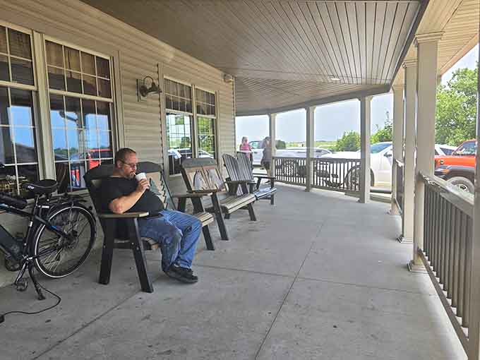 The covered porch offers rocking chairs for post-meal digestion, because sometimes you need a moment to recover from deliciousness.