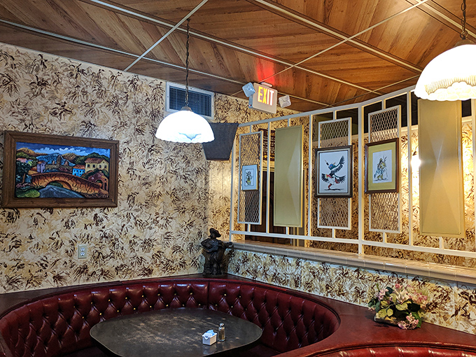 Vintage wallpaper and thoughtfully arranged decor create cozy dining nooks where generations of families have made memories over enchiladas and tamales.