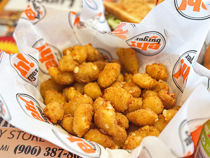 These aren't just any cheese curds &ndash; they're golden nuggets of joy with crispy exteriors giving way to stretchy, molten centers.