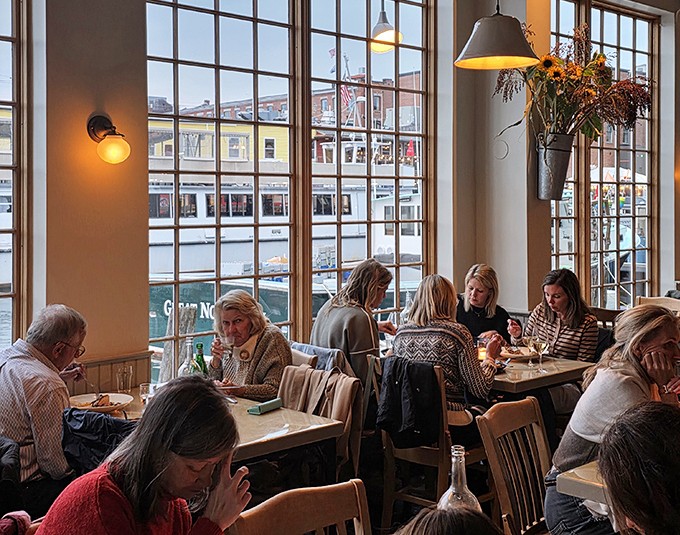The dining room buzzes with that special energy that only happens when everyone in the room knows they've made an excellent decision.