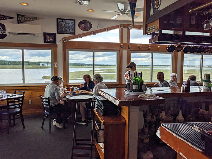 Happy diners gather around tables with spectacular views &ndash; the perfect setting for creating seafood memories that last a lifetime.