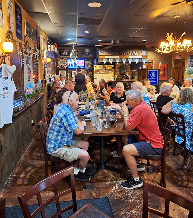 The dining room buzzes with conversation as regulars and newcomers alike bond over steins of beer and plates of authentic German specialties.