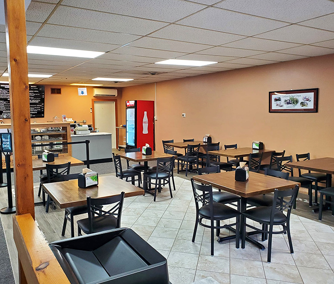 Dining area: No-nonsense tables and chairs invite you to sit, savor, and perhaps make a new friend. Community happens here, one bagel at a time.