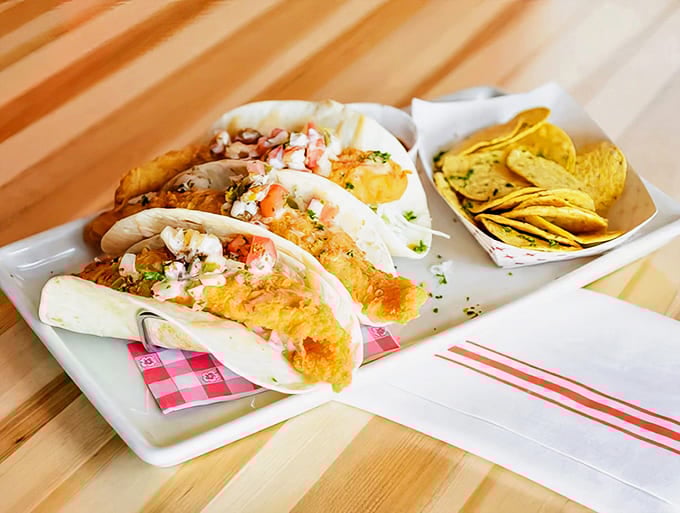 Fish tacos: Crispy beer-battered cod nestled in soft tortillas with fresh toppings &ndash; proof that O'Brien's excels beyond traditional seafood fare.