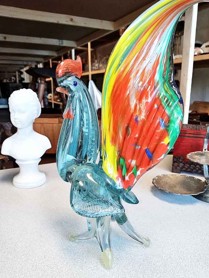 A glass rooster with plumage so colorful it makes actual roosters look like they're not even trying anymore.