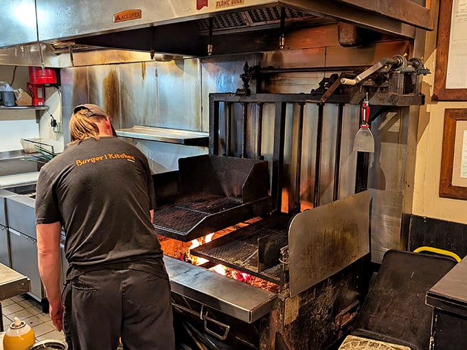 The open flame tells the whole story &ndash; real wood fire creating that unmistakable char that no gas grill could ever replicate.