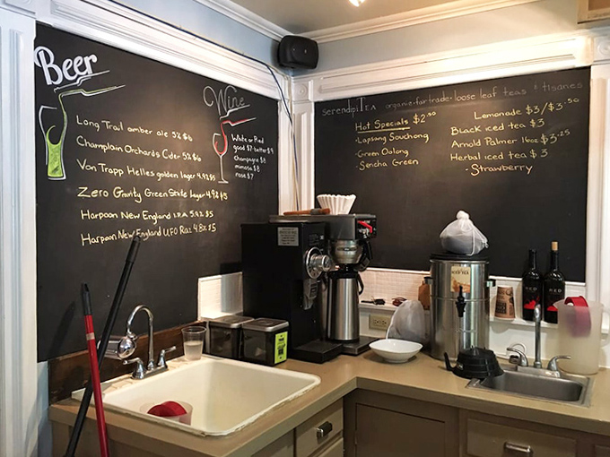 Liquid happiness: The beverage station's chalkboard menu showcases local brews and carefully selected wines to complement your meal perfectly.