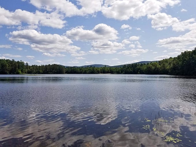 Crystal clear waters of Island Pond invite reflection &ndash; both the kind that mirrors the mountains and the kind that soothes the soul.