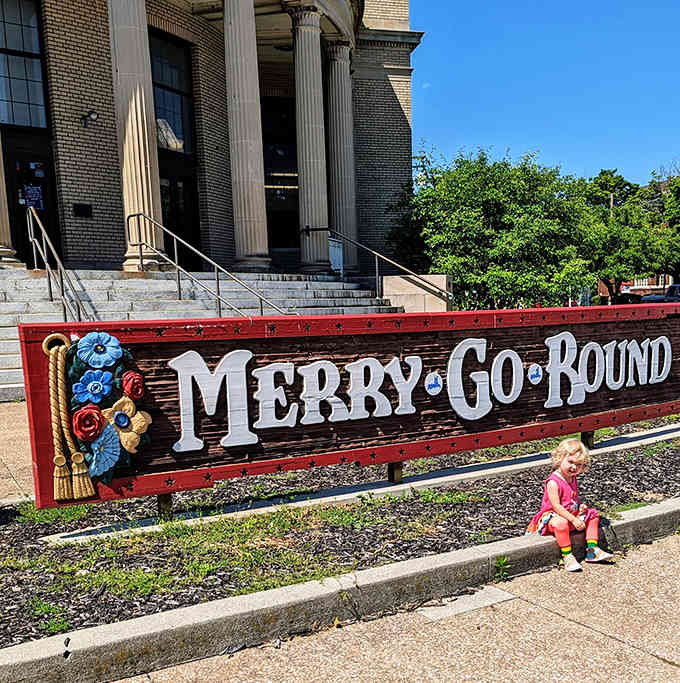 Even the youngest guests find magic here, where wooden horses stand ready to carry imaginations on endless circular adventures.