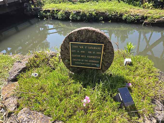 This memorial marker honors those who dedicated themselves to preserving this historic site, ensuring future generations can experience its magic.