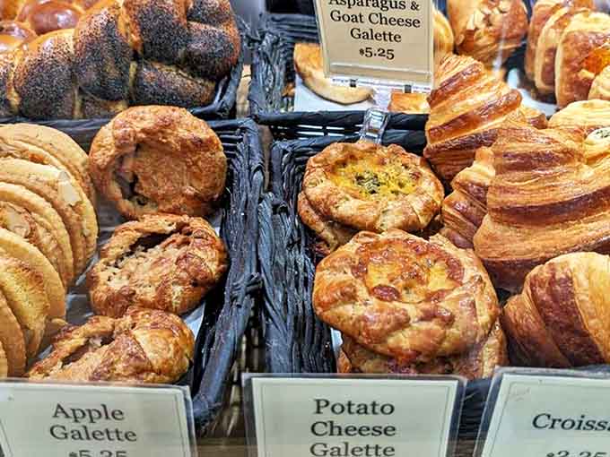 Bread heaven exists and it's right here! From rustic loaves to delicate pastries, this display is basically carb nirvana.