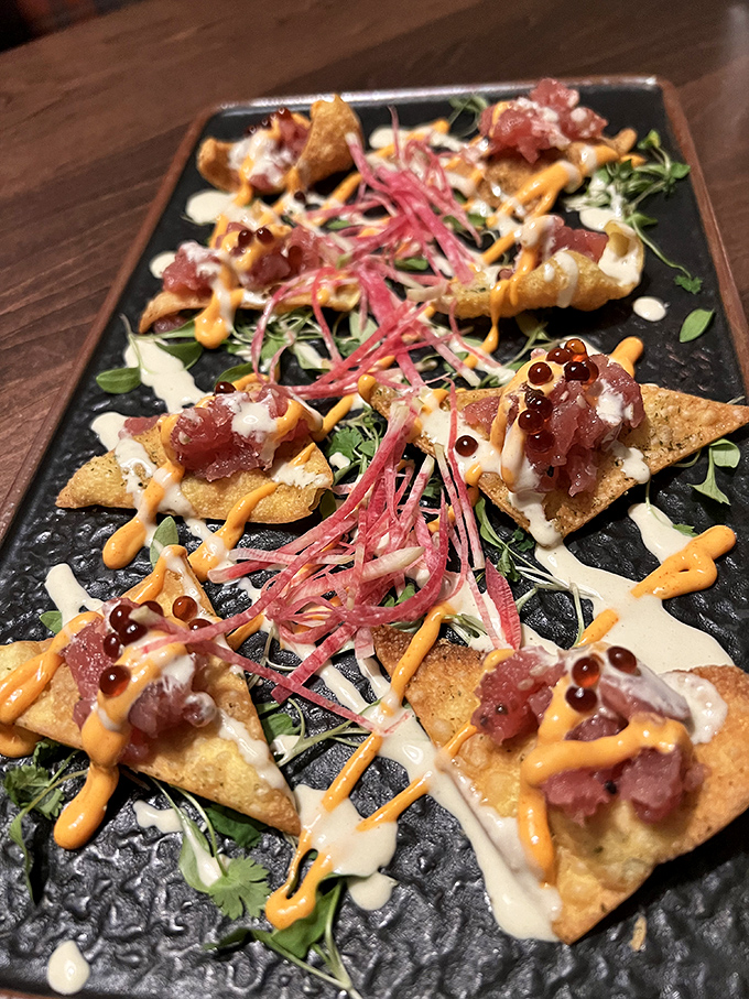 These aren't ordinary nachos – they're edible art where each chip becomes a canvas for flavor explosions and colorful garnishes.