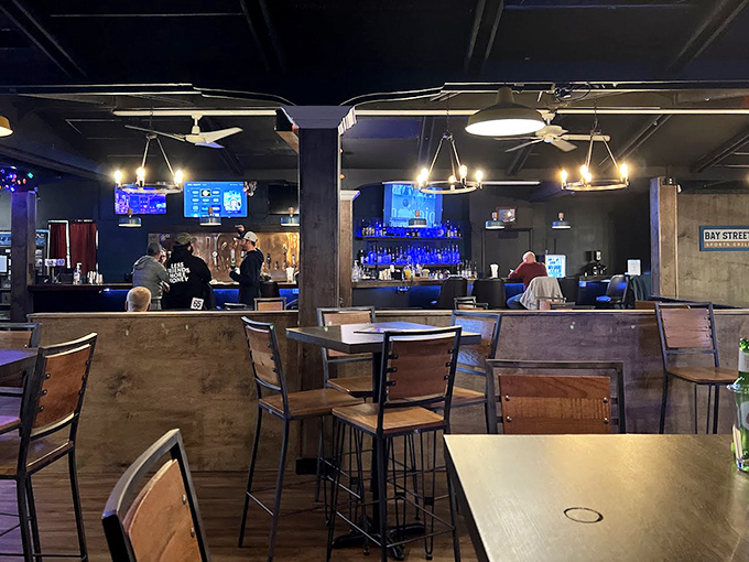 Rustic wooden booths and tables create the perfect backdrop for memorable meals and conversations that stretch into the evening.