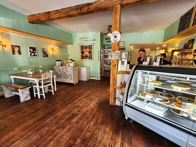 Exposed wooden beams and mint walls create a space that feels both timeless and perfectly Vermont. The display case whispers sweet nothings to everyone who enters.