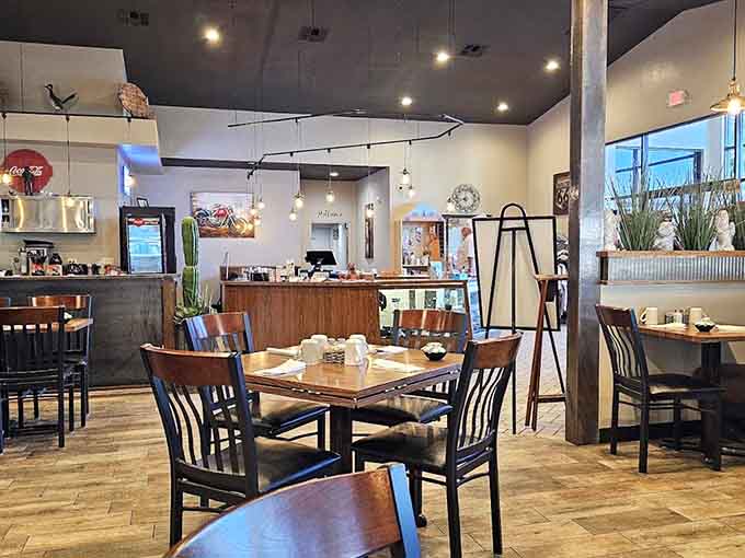 Another angle of the spacious dining room reveals modern touches mixed with rustic charm, creating an atmosphere that's both contemporary and comfortable.