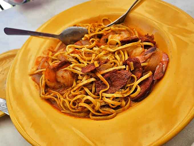Yellow pasta swirling with shrimp and sausage—a bowl that proves Louisiana and Italy would make excellent culinary roommates.
