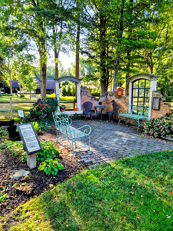 A garden patio that looks like it's waiting for Jane Austen characters to arrive for afternoon tea.