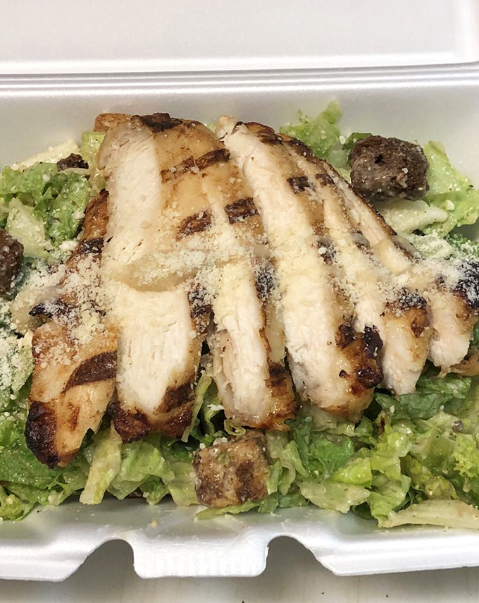 Chicken Caesar: Proof that "salad" doesn't have to mean "sacrifice" &ndash; grilled chicken with perfect char marks atop crisp romaine with house-made dressing.
