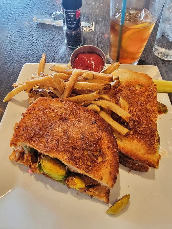 The perfect sandwich and fries duo &ndash; golden, crispy potatoes alongside a grilled creation that makes lunch feel like a special occasion.