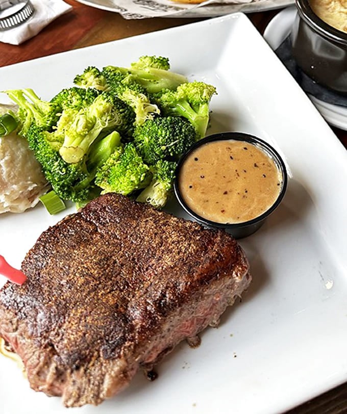 This sirloin steak sits proudly alongside fresh broccoli, a protein-packed performance that deserves a standing ovation from your taste buds.