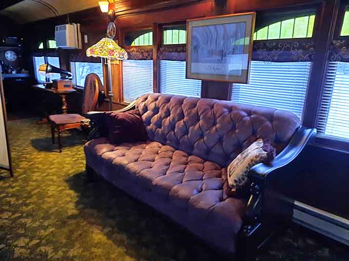 That tufted sofa has seen more history than most museum exhibits, and now it's inviting you to sit down and make yourself comfortable.