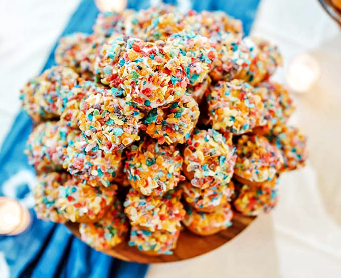 A mountain of rainbow-sprinkled donut holes creates an irresistible display that appeals to the kid in everyone who walks through the door.