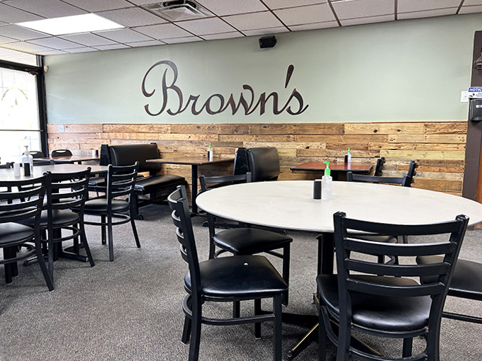 Simple tables and chairs invite conversation and community &ndash; no fancy tablecloths needed when the food is this good.