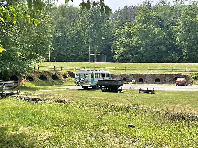 The town park setting makes these industrial monuments accessible to everyone, proving that historical preservation and community recreation can coexist beautifully.