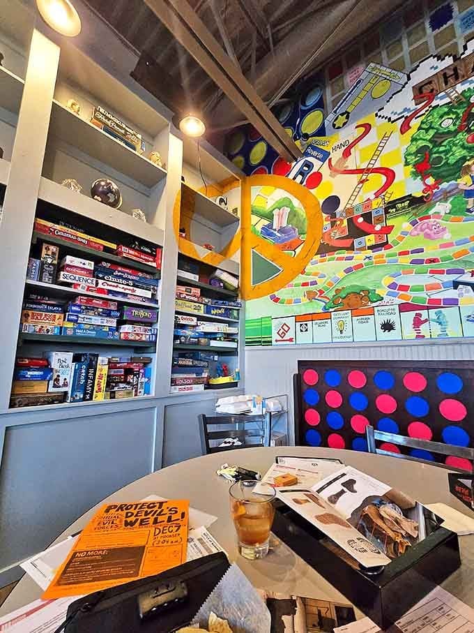 Board games line the walls like a library of fun waiting to happen &ndash; Monopoly arguments and Scrabble victories are served alongside the food.