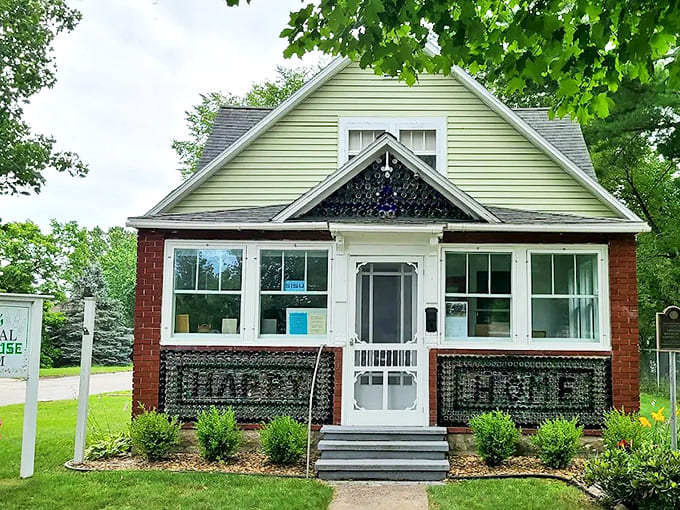 The Kaleva Bottle House Museum's unique exterior showcases thousands of glass bottles embedded in its walls, creating patterns that catch the sunlight.