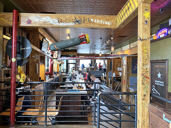 Where burgers meet Rube Goldberg. Watch your peanuts fly overhead before they land in your eager hands!