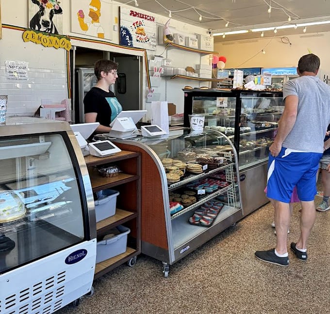The counter where dreams come true and decisions get made, though let's be honest, the answer is always "yes" to more pastries.
