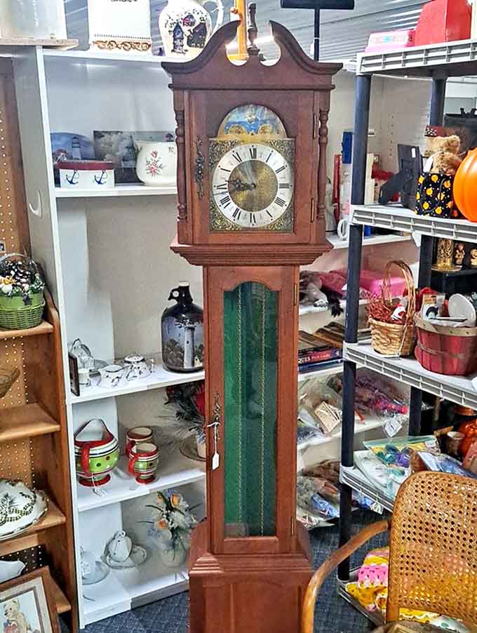 This stately grandfather clock stands as a testament to craftsmanship – its wooden case and mechanical heart representing a time before digital displays.