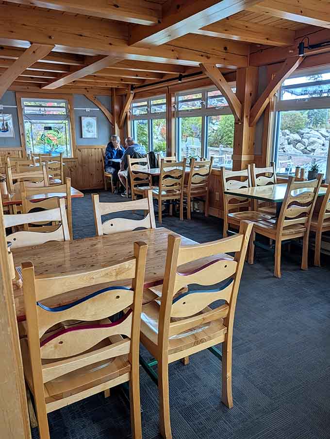 The dining room's windows frame the lake like nature's own artwork, constantly changing and always worth watching between bites.