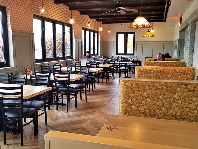 Another interior angle: Honeycomb-patterned booths and herringbone floors create a hive of breakfast activity where time seems to slow deliciously.