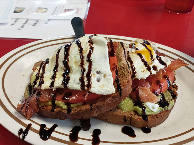 Avocado toast gets the Ruthie's treatment &ndash; eggs drizzled with balsamic on hearty bread, proving classics can evolve without losing their soul.