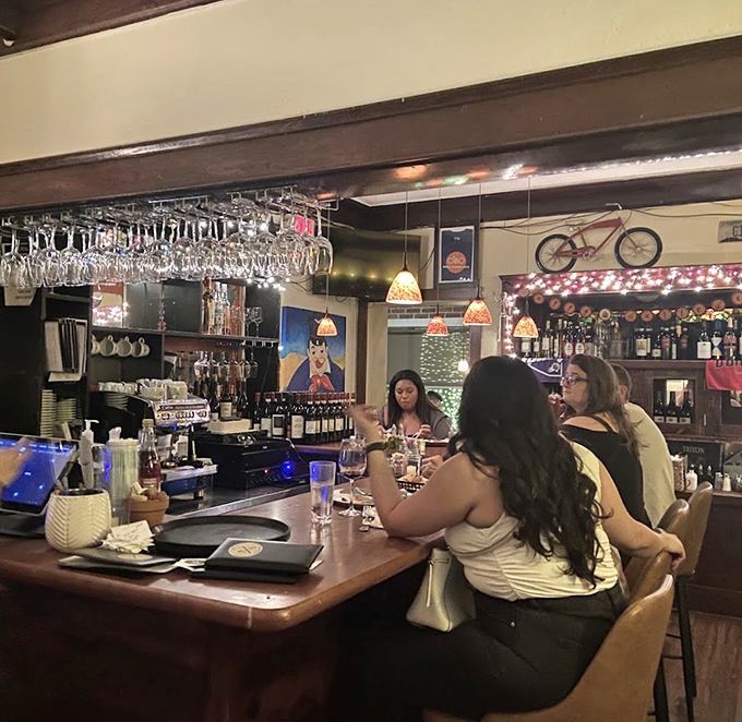 Bar: Where Italian wines flow freely and friendly bartenders create the perfect prelude to your pasta adventure or crepe conclusion.